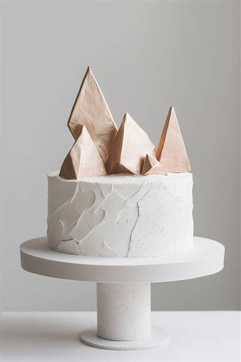 This Stylish Cake Showcases A Minimalist Approach With Sharp Angular Fondant Textures And