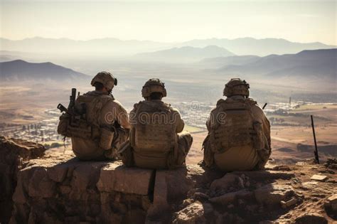 Unity In The Desert Soldiers Sitting On A Commanding Cliff Stock