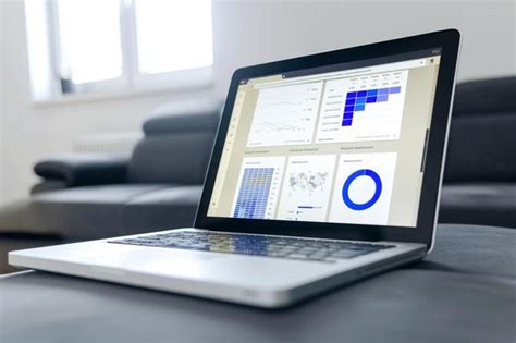 Laptop With Chart On Screen Premium Ai Generated Image