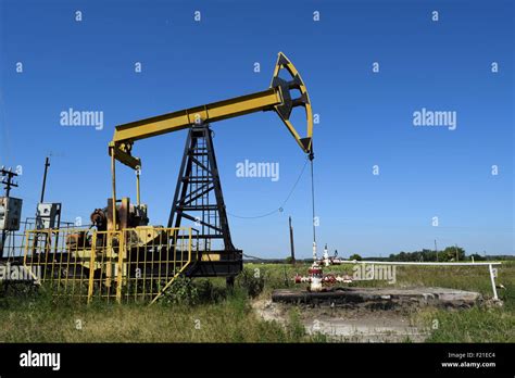 The Pumping Unit As The Oil Pump Installed On A Well Equipment Of Oil