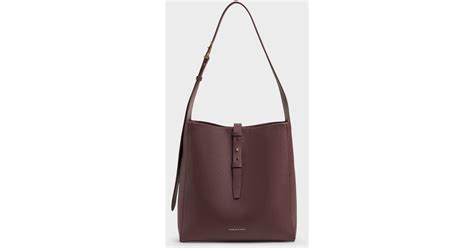 Charles And Keith Beryl Recycled Leather Belted Hobo Bag In Purple Lyst Uk