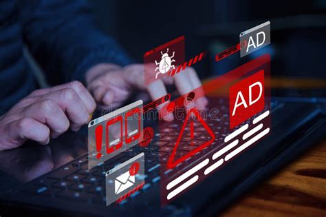 Businessman Hands Typing On Laptop With Triangular Malware Caution