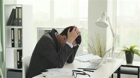 Puzzled Manager Sorting Papers In Office Stock Footage Sbv 348416904