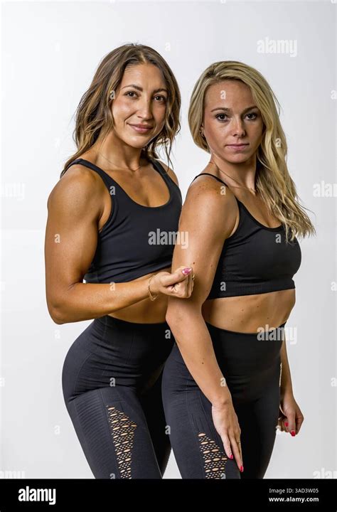 Two Gorgeous Athletic Fit Models Pose Confidently Their Toned Muscles