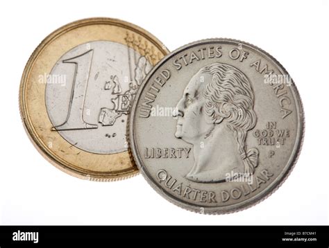 Used One Euro Coin And One Usa Quarter Dollar Coin On White Background