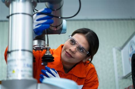 Premium Photo In An Electronic Parts Facility Female Engineers In The