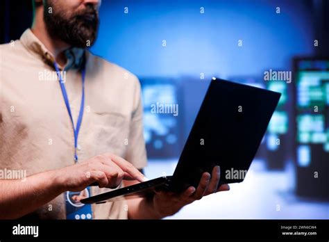 Technical Support Worker Ensuring Data Center Servers Are Properly
