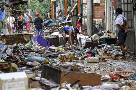 ‘back To Zero Manila Flood Victims Face Daunting Task Of Cleaning Up