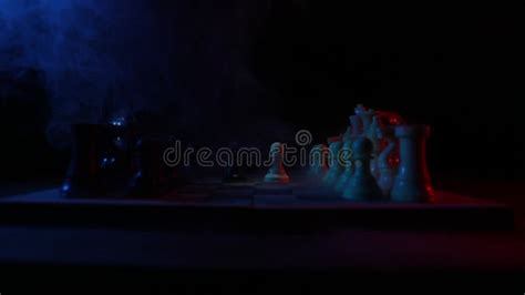 Chess Board Game Concept Chess Figures On A Dark Background With Smoke