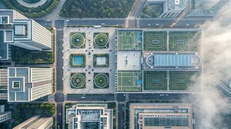 Aerial View Of A Modern Cityscape With Parks And Buildings Stock