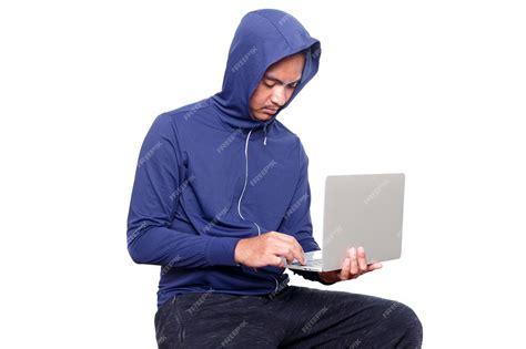 Premium Photo Hacker In Blue Hoodie Using Laptop Isolated On White Background Concept Of Cyber