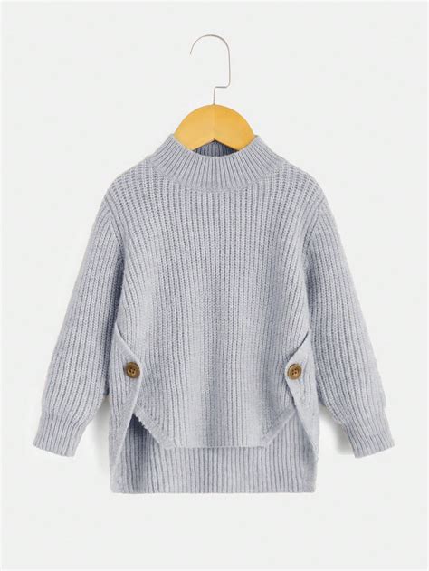 كنزة صوف وقوف الياقة تفاصيل ازرار بنت طفل