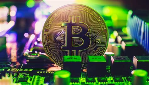 Premium Photo Blockchain Technology Bitcoin Mining Concept Bitcoin Golden Coin On Computer