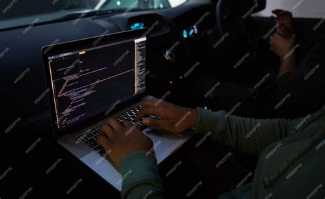 premium photo hacker code and laptop with person in car for
