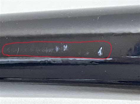 my new bike has scuff marks on the top tube from being clamped
