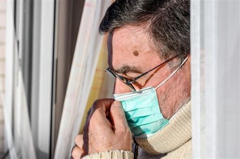 Premium Photo Close Up Portrait Of Man Making Face By Window