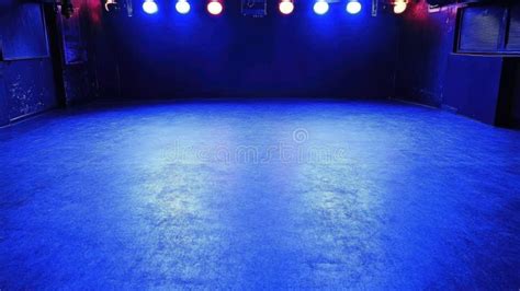 Empty Dance Floor Illuminated By Colorful Lights In A Nightclub Stock