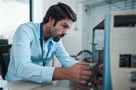 Serious Man It Or Technician Fixing Computer Pc Or Processor In