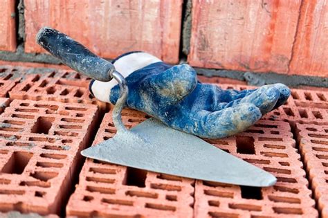 Premium Photo Construction Tool For Laying Bricks And Blocks