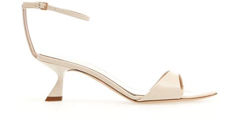 Ninalilou 50mm Heel Butter Patent Sandals In Natural Lyst