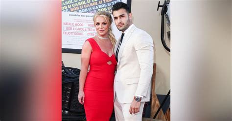 Britney Spears Caresses Her Cleavage In Provocative Video Photos