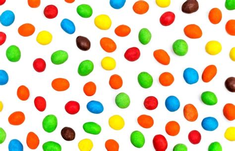 Premium Photo Background From Colorful Round Candy On White