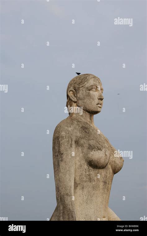 Crow Resting On The Head Of A Naked Woman Sculpture Built On Kollam City Coastal Beach Shore