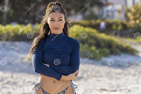 Lovely Mixed Race Bikini Model Posing Outdoors On A Caribbean Beach