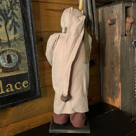 Santa Holding Basket The 13th Colony