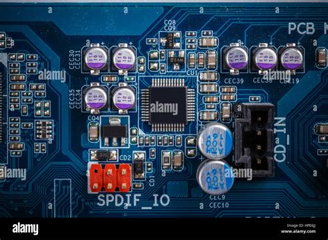Integrated Semiconductor Microchip Microprocessor On Blue Circuit Board Stock Photo Alamy