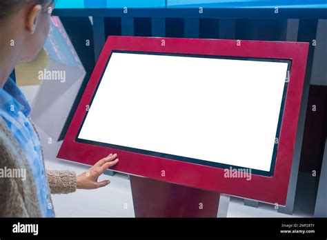 Woman Using Interactive Empty White Touchscreen Display Kiosk At Exhibition Stock Photo Alamy
