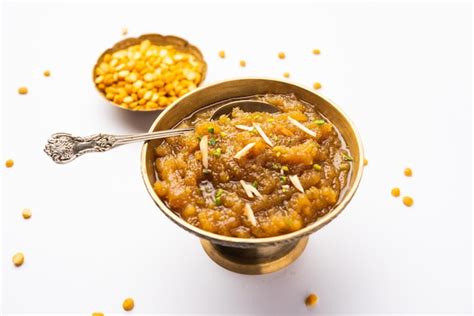 Premium Photo Besan Halwa Shira Sheera Is A Rich Dessert Made With