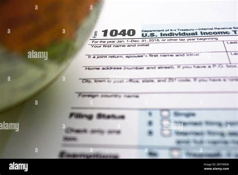Tax Return Form 1040 And Dollar Banknote Us Individual Income Stock