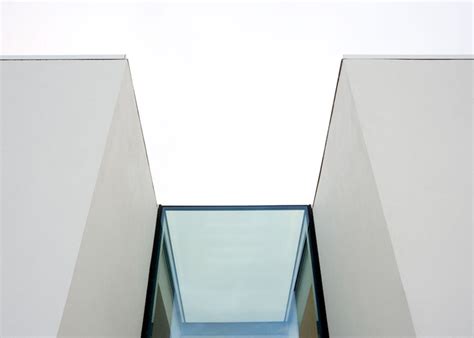 Volcanic Stone Wall Hides Doorway Into B25 House By Pk Arkitektar