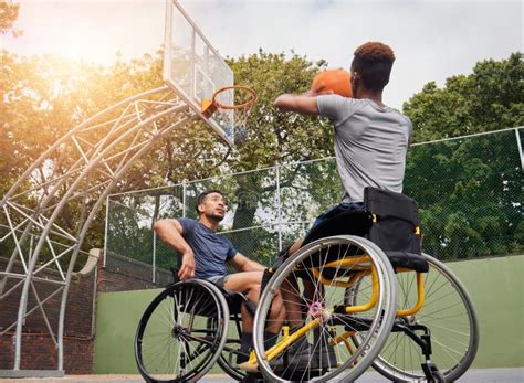 Wheelchair Athlete Or A Man With A Disability And Bike For Handicap