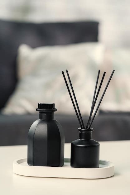 Premium Photo Aroma Diffuser Bottle With Sticks In Living Room