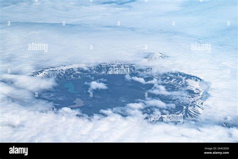 An Aerial Of The Tulik Volcano Behind The Okmok Caldera Rim On The