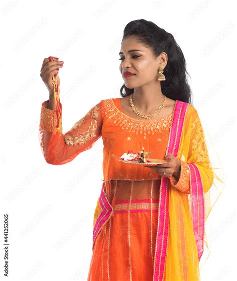 Beautiful Indian Girl Showing Rakhi With Pooja Thali On Occasion Of
