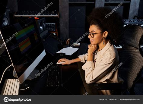 Woman Immersed Editing Music Computer Recording Studio Band Rehearsal Stock Photo