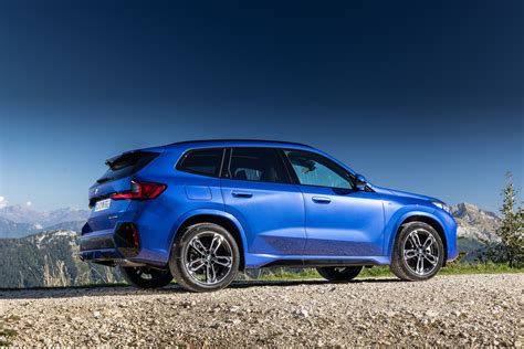 2023 Bmw X1 M Portimao Blue Poses For The Camera For France Premiere