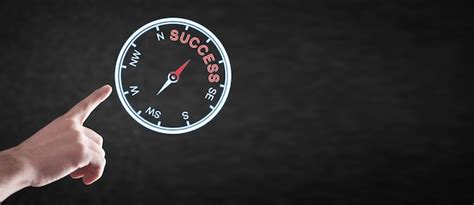 Compass Pointing To Success Business Success Premium Photo