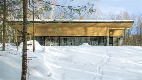 Stephane Gaulin Brown Places Curved Roof On Quebec Chalet Dezeen