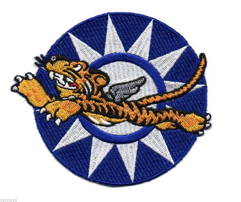 The Flying Tigers Logo By Invoking The Legendary Flying Tigers The Air