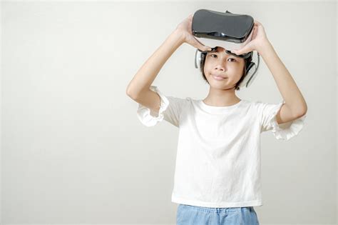 Smiling Girl With Glasses Of Virtual Realityvr Application Test Asian