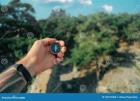Man Holds A Compass In His Hand Man Wathing Compass Holding In His