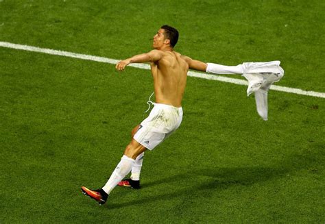 Cristiano Ronaldo Of Real Madrid Takes Off His Shirt In Celebration