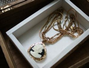 2 Gold And White Pendants Free Image Peakpx