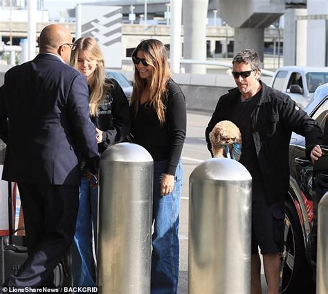 Christian Bale And Wife Sibi Embrace Their Daughter Luka 18 During An
