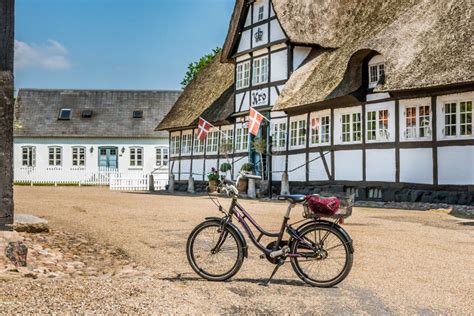 A Bike In Front Of An Idyllic Half Timbered Tavern In Denmark Editorial