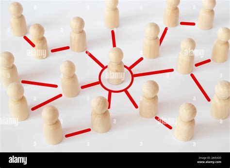 People Figurines Connected By Blue Lines Cooperation And Interaction Between People And